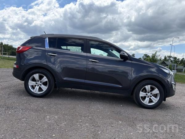 Grey Kia Sportage 2012 in Daugavpils, with an engine capacity of 1.70 L and mileage of 265 thousand km for 7350 €, photo 6 on AUTOMOTO.COM.LV