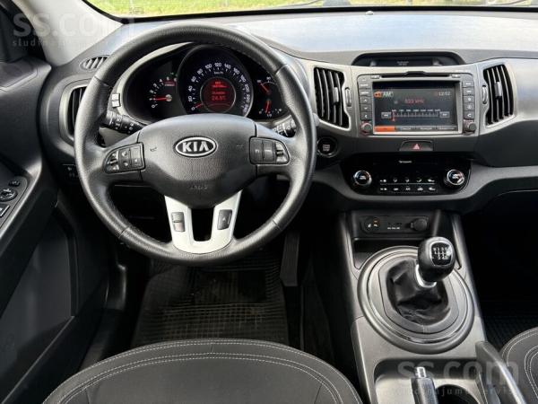 Grey Kia Sportage 2012 in Daugavpils, with an engine capacity of 1.70 L and mileage of 265 thousand km for 7350 €, photo 10 on AUTOMOTO.COM.LV