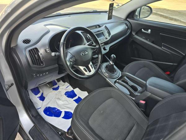 Grey Kia Sportage 2012 in Taurage, with an engine capacity of 1.59 L and mileage of 185 thousand km for 5900 €, photo 10 on AUTOMOTO.COM.LV