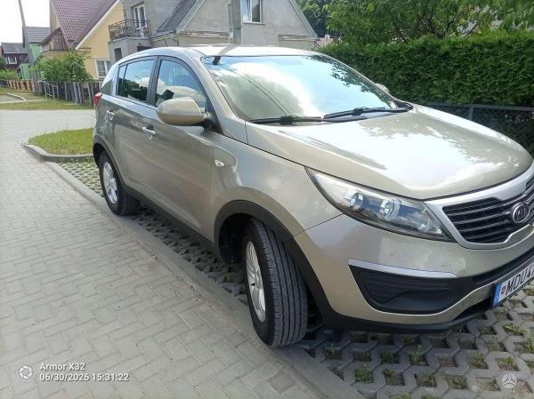 Grey Kia Sportage 2012 in Vilnius, with an engine capacity of 1.69 L and mileage of 217 thousand km for 6800 €, photo 1 on AUTOMOTO.COM.LV