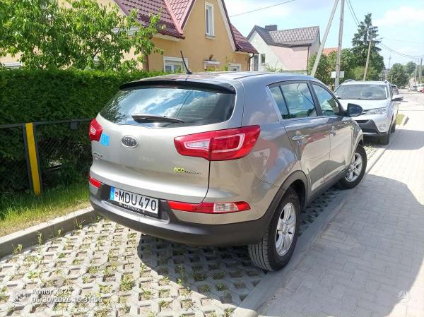 Grey Kia Sportage 2012 in Vilnius, with an engine capacity of 1.69 L and mileage of 217 thousand km for 6800 €, photo 3 on AUTOMOTO.COM.LV