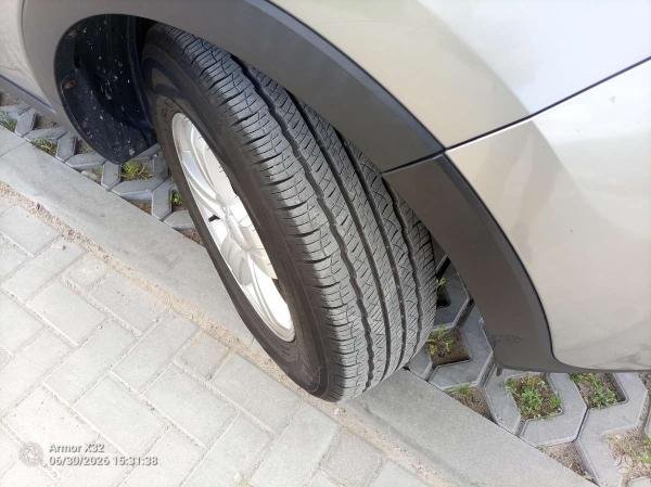 Grey Kia Sportage 2012 in Vilnius, with an engine capacity of 1.69 L and mileage of 217 thousand km for 6800 €, photo 6 on AUTOMOTO.COM.LV