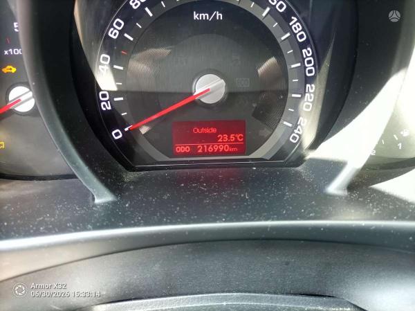 Grey Kia Sportage 2012 in Vilnius, with an engine capacity of 1.69 L and mileage of 217 thousand km for 6800 €, photo 9 on AUTOMOTO.COM.LV