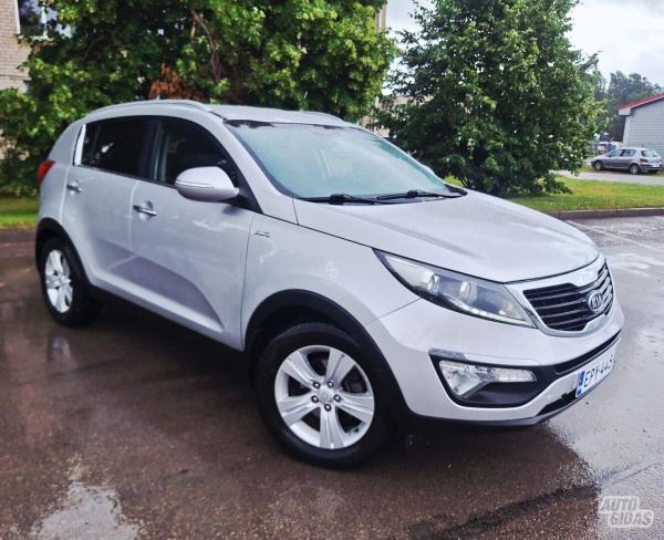 Grey Kia Sportage 2012 in Radviliskis, with an engine capacity of 2.00 L and mileage of 233 thousand km for 6900 €, photo 3 on AUTOMOTO.COM.LV