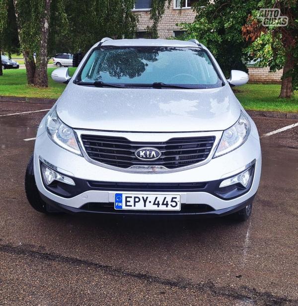 Grey Kia Sportage 2012 in Radviliskis, with an engine capacity of 2.00 L and mileage of 233 thousand km for 6900 €, photo 5 on AUTOMOTO.COM.LV