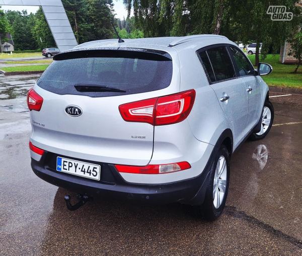 Grey Kia Sportage 2012 in Radviliskis, with an engine capacity of 2.00 L and mileage of 233 thousand km for 6900 €, photo 6 on AUTOMOTO.COM.LV
