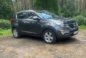 Grey Kia Sportage 2012 in Riga, with an engine capacity of 2.00 L and mileage of 252 thousand km for 7500 €, photo  on AUTOMOTO.COM.LV