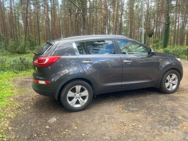 Grey Kia Sportage 2012 in Riga, with an engine capacity of 2.00 L and mileage of 252 thousand km for 7500 €, photo 2 on AUTOMOTO.COM.LV