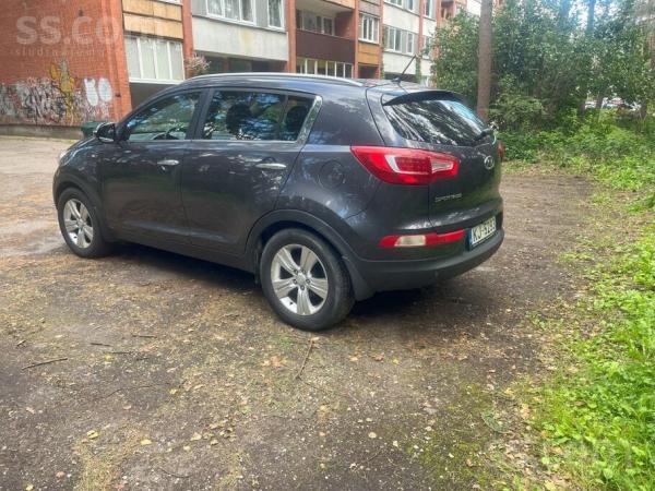 Grey Kia Sportage 2012 in Riga, with an engine capacity of 2.00 L and mileage of 252 thousand km for 7500 €, photo 3 on AUTOMOTO.COM.LV