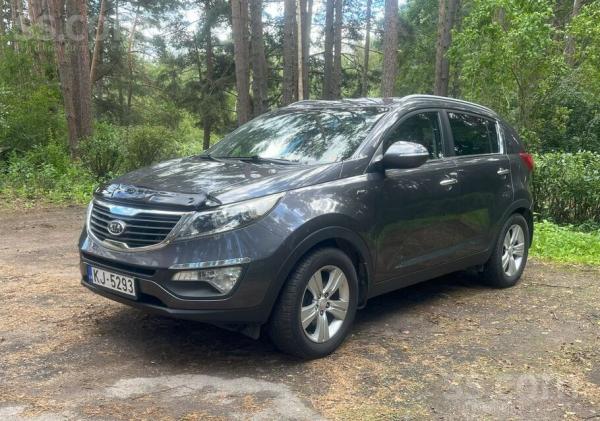 Grey Kia Sportage 2012 in Riga, with an engine capacity of 2.00 L and mileage of 252 thousand km for 7500 €, photo 4 on AUTOMOTO.COM.LV
