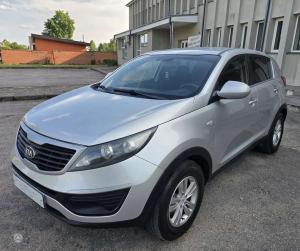 Pelēks Kia Sportage 2012 Tauragė, ar dzinēja tilpumu 1.59 L un nobraukumu 185 tūkst. km par 5600 €, foto  vietnē AUTOMOTO.COM.LV