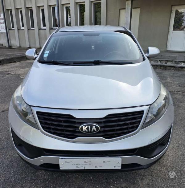 Grey Kia Sportage 2012 in Taurage, with an engine capacity of 1.59 L and mileage of 185 thousand km for 5600 €, photo 2 on AUTOMOTO.COM.LV