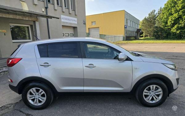 Grey Kia Sportage 2012 in Taurage, with an engine capacity of 1.59 L and mileage of 185 thousand km for 5600 €, photo 4 on AUTOMOTO.COM.LV