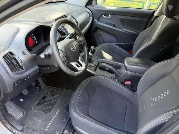Pelēks Kia Sportage 2012 Tauragė, ar dzinēja tilpumu 1.69 L un nobraukumu 245 tūkst. km par 5500 €, foto 10 vietnē AUTOMOTO.COM.LV