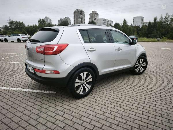 Pelēks Kia Sportage 2012 Viļņa, ar dzinēja tilpumu 2.00 L un nobraukumu 297 tūkst. km par 5500 €, foto 5 vietnē AUTOMOTO.COM.LV