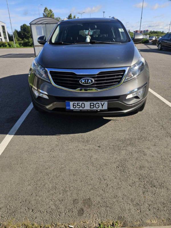 Grey Kia Sportage 2012 in Tallinn, with an engine capacity of 2.00 L and mileage of 277 thousand km for 8500 €, photo 1 on AUTOMOTO.COM.LV