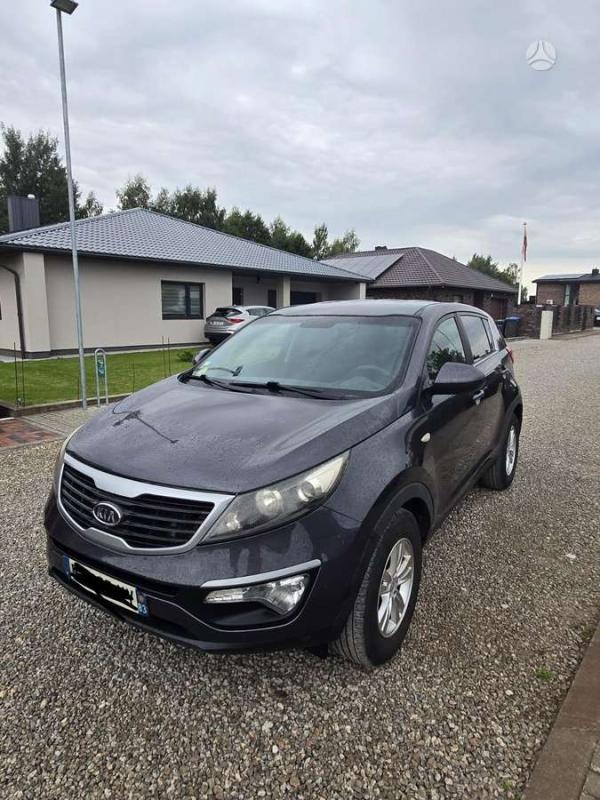 Grey Kia Sportage 2012 in Taurage, with an engine capacity of 1.69 L and mileage of 249 thousand km for 4600 €, photo 1 on AUTOMOTO.COM.LV