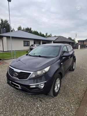Grey Kia Sportage 2012 in Taurage, with an engine capacity of 1.69 L and mileage of 249 thousand km for 4600 €, photo 1 on AUTOMOTO.COM.LV