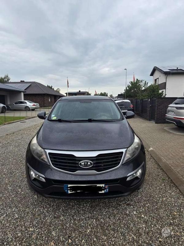 Grey Kia Sportage 2012 in Taurage, with an engine capacity of 1.69 L and mileage of 249 thousand km for 4600 €, photo 3 on AUTOMOTO.COM.LV