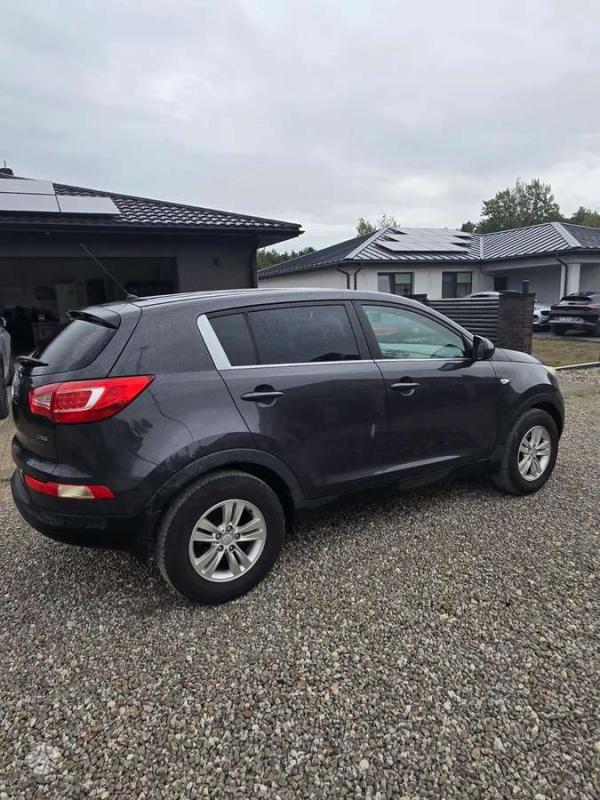 Grey Kia Sportage 2012 in Taurage, with an engine capacity of 1.69 L and mileage of 249 thousand km for 4600 €, photo 4 on AUTOMOTO.COM.LV