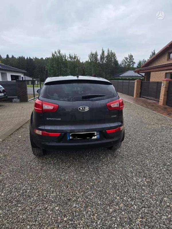 Grey Kia Sportage 2012 in Taurage, with an engine capacity of 1.69 L and mileage of 249 thousand km for 4600 €, photo 5 on AUTOMOTO.COM.LV