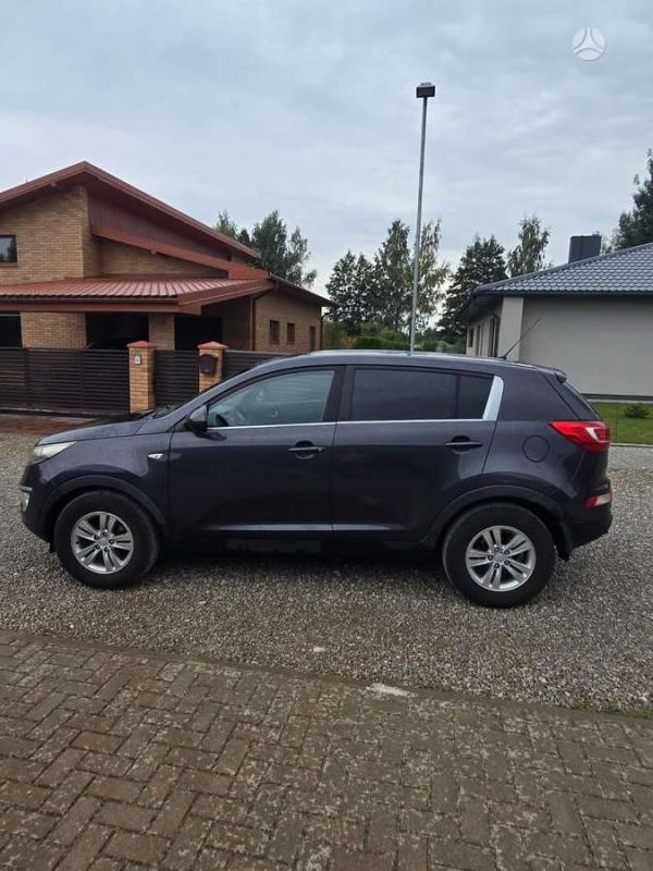 Grey Kia Sportage 2012 in Taurage, with an engine capacity of 1.69 L and mileage of 249 thousand km for 4600 €, photo 6 on AUTOMOTO.COM.LV