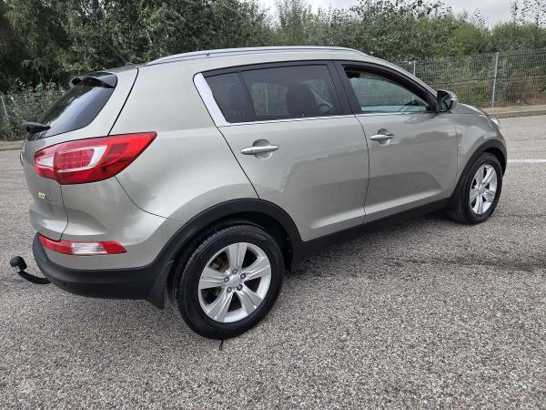 Grey Kia Sportage 2012 in Marijampole, with an engine capacity of 1.69 L and mileage of 225 thousand km for 5250 €, photo 4 on AUTOMOTO.COM.LV