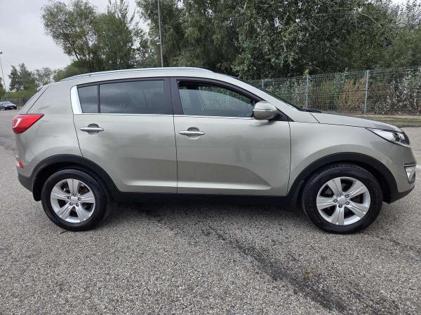 Grey Kia Sportage 2012 in Marijampole, with an engine capacity of 1.69 L and mileage of 225 thousand km for 5250 €, photo 5 on AUTOMOTO.COM.LV