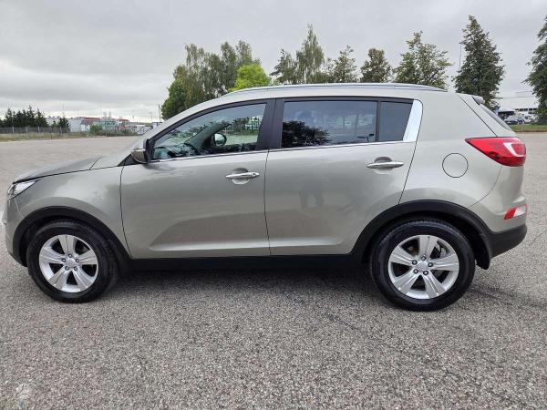 Grey Kia Sportage 2012 in Marijampole, with an engine capacity of 1.69 L and mileage of 225 thousand km for 5250 €, photo 9 on AUTOMOTO.COM.LV