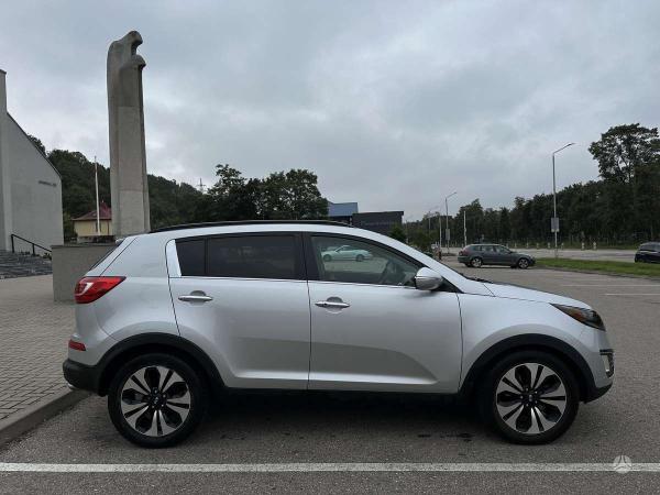 Grey Kia Sportage 2012 in Kaunas, with an engine capacity of 2.00 L and mileage of 188 thousand km for 6700 €, photo 5 on AUTOMOTO.COM.LV
