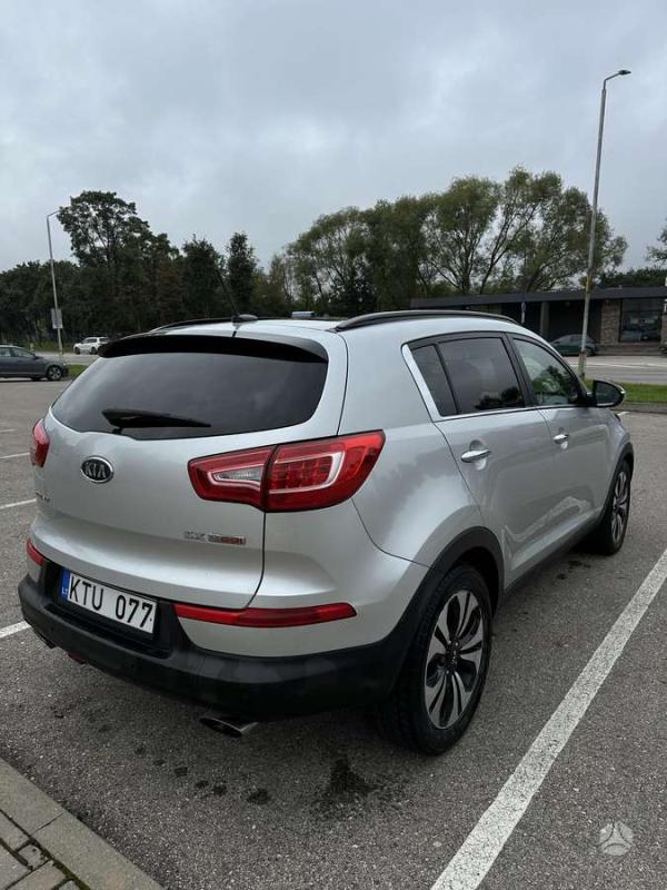 Grey Kia Sportage 2012 in Kaunas, with an engine capacity of 2.00 L and mileage of 188 thousand km for 6700 €, photo 6 on AUTOMOTO.COM.LV