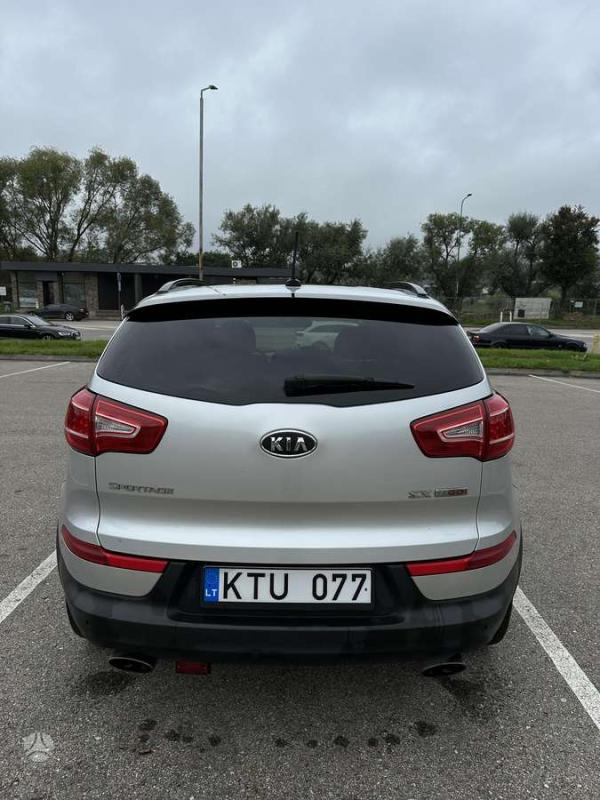 Grey Kia Sportage 2012 in Kaunas, with an engine capacity of 2.00 L and mileage of 188 thousand km for 6700 €, photo 7 on AUTOMOTO.COM.LV