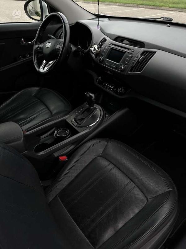 Grey Kia Sportage 2012 in Kaunas, with an engine capacity of 2.00 L and mileage of 188 thousand km for 6700 €, photo 11 on AUTOMOTO.COM.LV