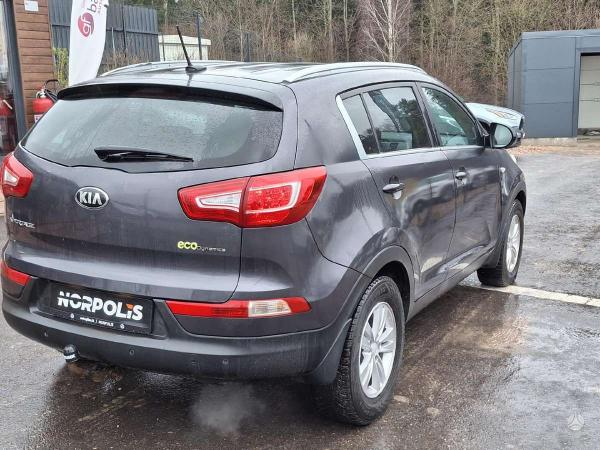 Grey Kia Sportage 2013 in Vilnius, with an engine capacity of 1.59 L and mileage of 199 thousand km for 7399 €, photo 11 on AUTOMOTO.COM.LV