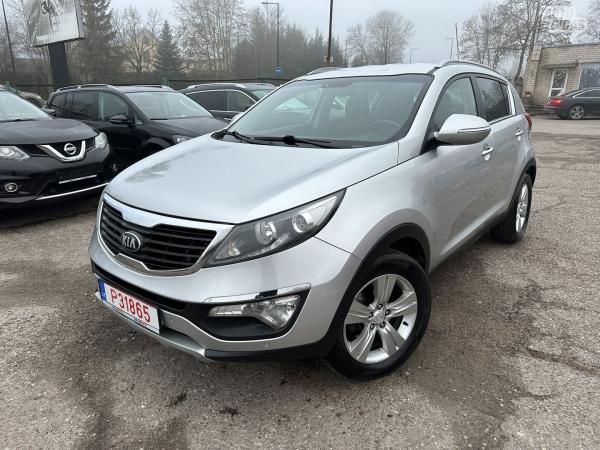 Grey Kia Sportage 2013 in Alytus, with an engine capacity of 1.70 L and mileage of 269 thousand km for 6600 €, photo 1 on AUTOMOTO.COM.LV