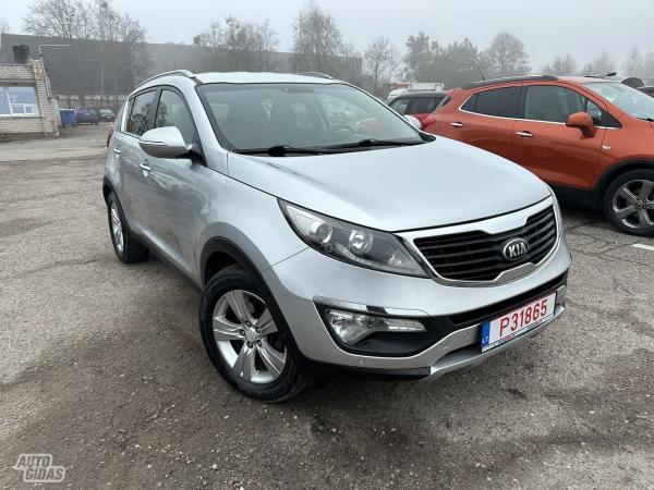 Grey Kia Sportage 2013 in Alytus, with an engine capacity of 1.70 L and mileage of 269 thousand km for 6600 €, photo 2 on AUTOMOTO.COM.LV