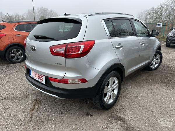 Grey Kia Sportage 2013 in Alytus, with an engine capacity of 1.70 L and mileage of 269 thousand km for 6600 €, photo 3 on AUTOMOTO.COM.LV