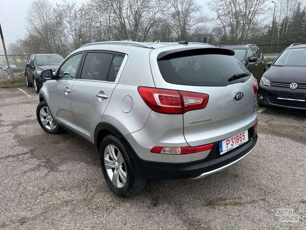 Grey Kia Sportage 2013 in Alytus, with an engine capacity of 1.70 L and mileage of 269 thousand km for 6600 €, photo 4 on AUTOMOTO.COM.LV