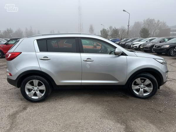 Grey Kia Sportage 2013 in Alytus, with an engine capacity of 1.70 L and mileage of 269 thousand km for 6600 €, photo 5 on AUTOMOTO.COM.LV