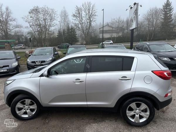 Grey Kia Sportage 2013 in Alytus, with an engine capacity of 1.70 L and mileage of 269 thousand km for 6600 €, photo 6 on AUTOMOTO.COM.LV