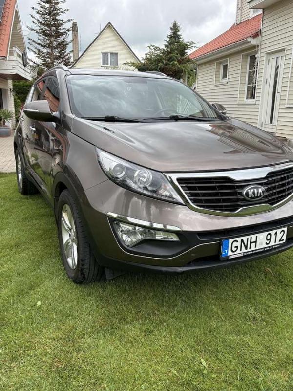 Grey Kia Sportage 2013 in Klaipeda, with an engine capacity of 1.69 L and mileage of 149 thousand km for 7800 €, photo 4 on AUTOMOTO.COM.LV