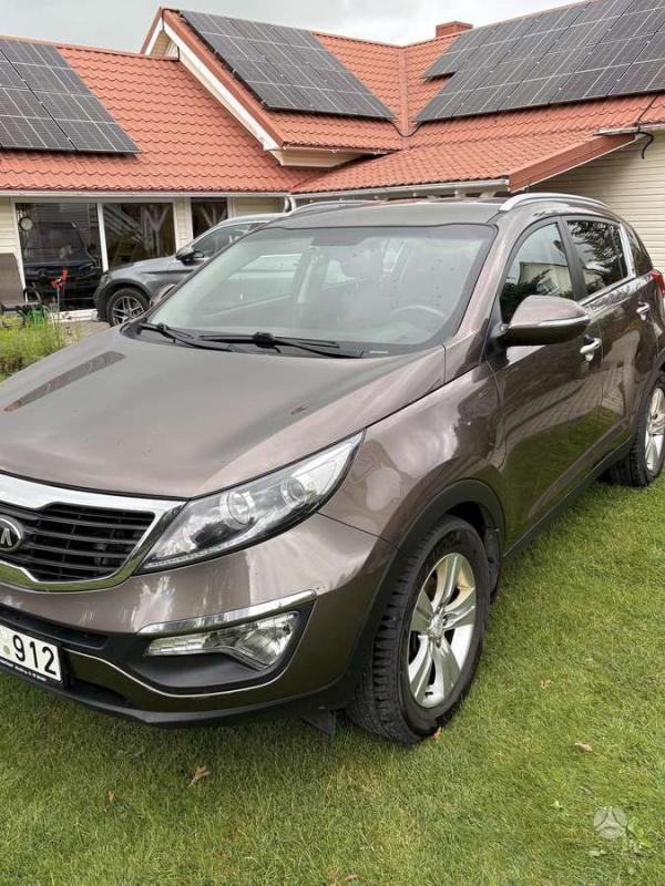 Grey Kia Sportage 2013 in Klaipeda, with an engine capacity of 1.69 L and mileage of 149 thousand km for 7800 €, photo 5 on AUTOMOTO.COM.LV