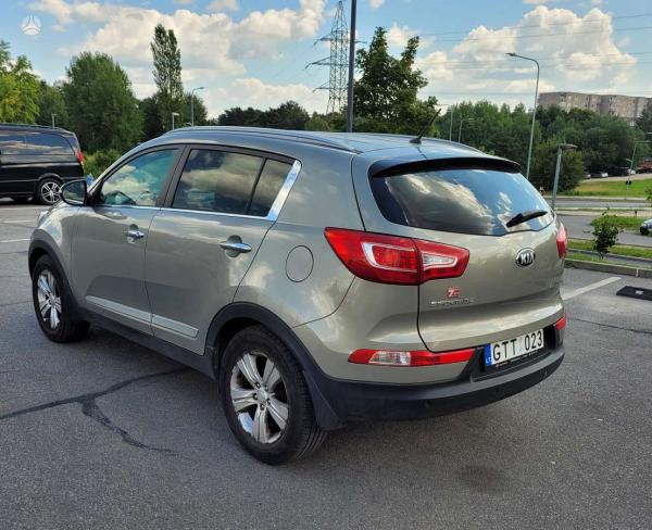 Grey Kia Sportage 2013 in Vilnius, with an engine capacity of 2.00 L and mileage of 69 thousand km for 8500 €, photo 3 on AUTOMOTO.COM.LV