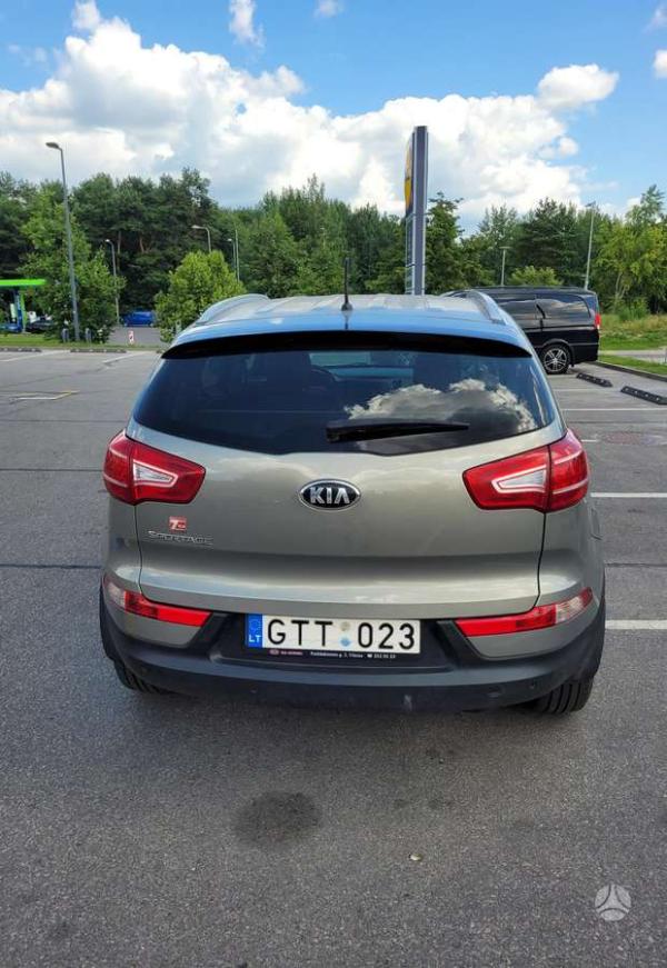 Grey Kia Sportage 2013 in Vilnius, with an engine capacity of 2.00 L and mileage of 69 thousand km for 8500 €, photo 4 on AUTOMOTO.COM.LV