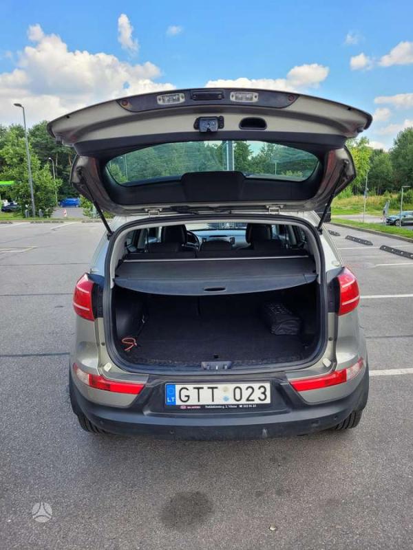 Grey Kia Sportage 2013 in Vilnius, with an engine capacity of 2.00 L and mileage of 69 thousand km for 8500 €, photo 5 on AUTOMOTO.COM.LV