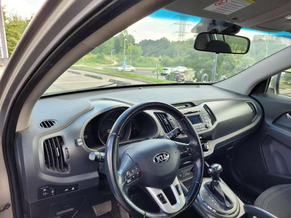 Grey Kia Sportage 2013 in Vilnius, with an engine capacity of 2.00 L and mileage of 69 thousand km for 8500 €, photo 6 on AUTOMOTO.COM.LV