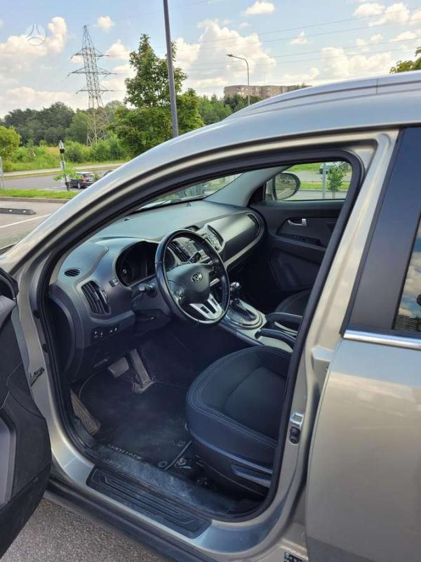 Grey Kia Sportage 2013 in Vilnius, with an engine capacity of 2.00 L and mileage of 69 thousand km for 8500 €, photo 7 on AUTOMOTO.COM.LV