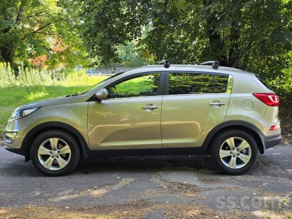 Pelēks Kia Sportage 2013 Rīga, ar dzinēja tilpumu 1.70 L un nobraukumu 162 tūkst. km par 6900 €, foto 6 vietnē AUTOMOTO.COM.LV