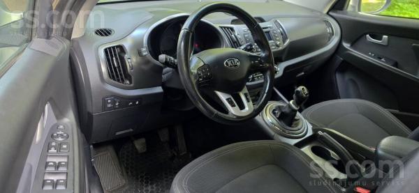 Pelēks Kia Sportage 2013 Rīga, ar dzinēja tilpumu 1.70 L un nobraukumu 162 tūkst. km par 6900 €, foto 8 vietnē AUTOMOTO.COM.LV