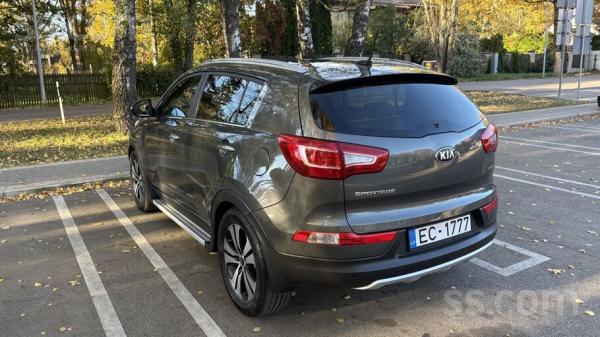 Kia Sportage 2013 Rīga vietnē Pelēks Kia Sportage 2013 Rīga, ar dzinēja tilpumu 2.00 L un nobraukumu 359 tūkst. km par 6400 €, foto 5 vietnē AUTOMOTO.COM.LV